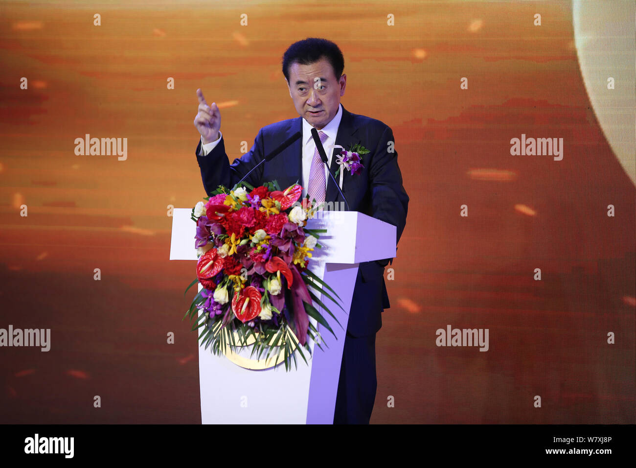 Wang Jianlin, Chairman of Wanda Group, delivers a speech during a ...
