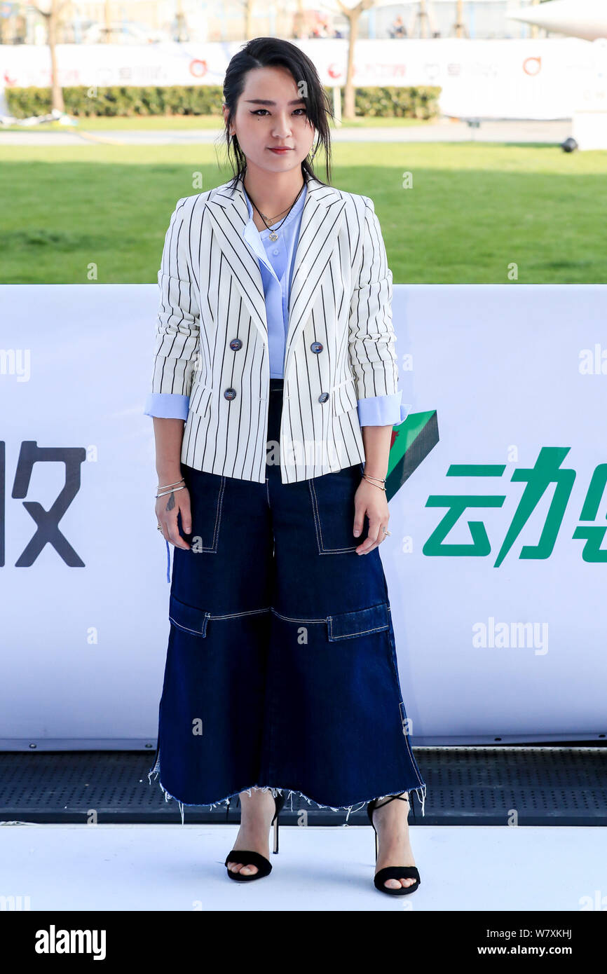 Chinese singer Zhou Bichang arrives on the red carpet for the 24th ...