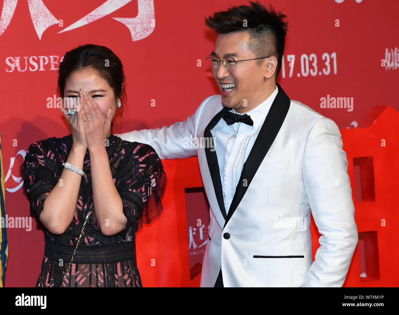 Taiwanese actress Ruby Lin, left, interacts with actor and director Alec Su at the premiere of ...