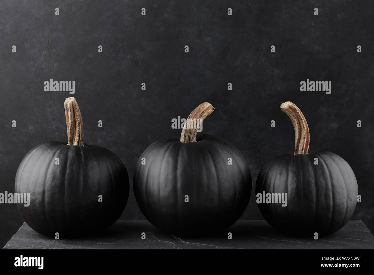 Black background pumpkins hi-res stock photography and images - Alamy