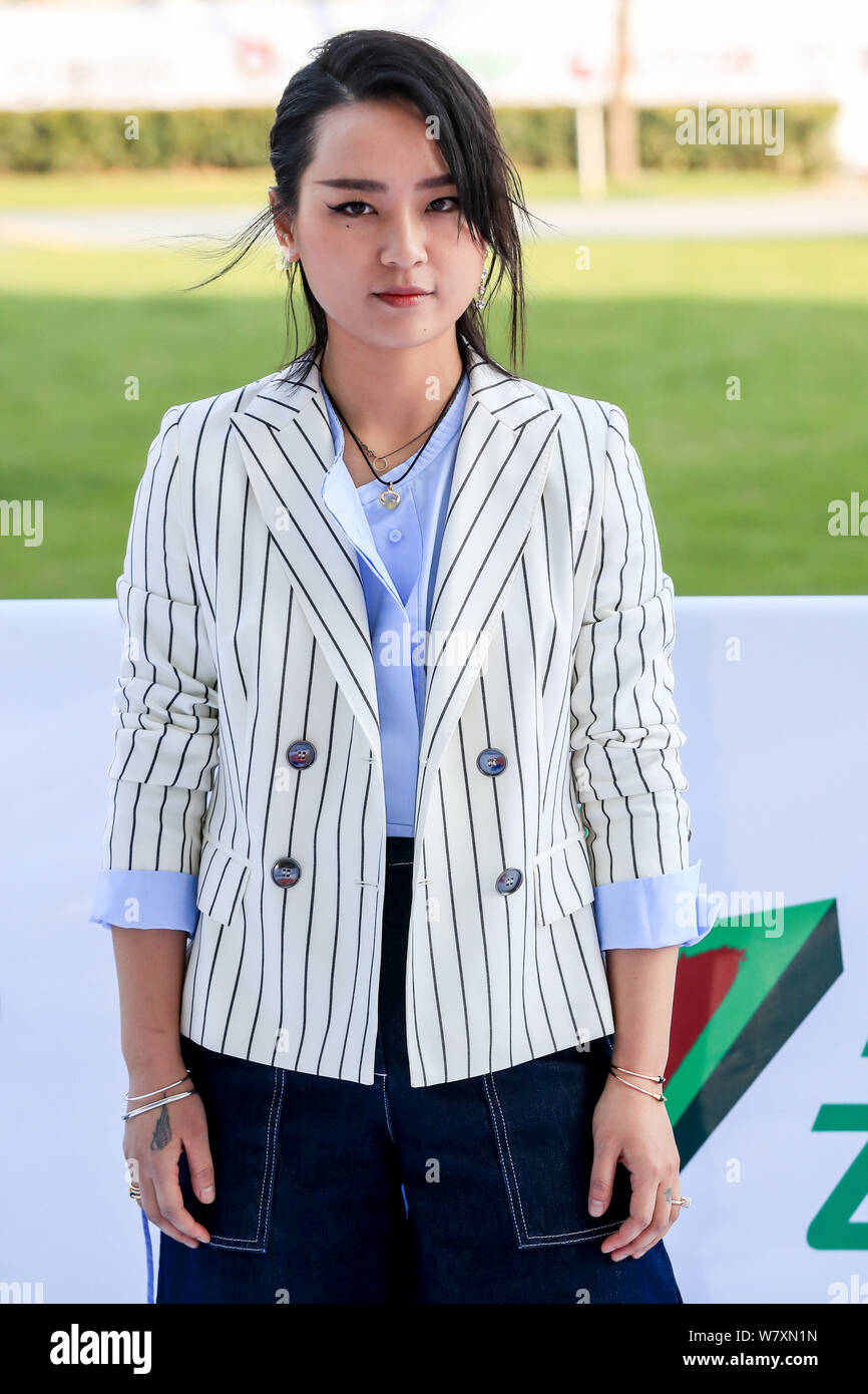 Chinese singer Zhou Bichang arrives on the red carpet for the 24th ...