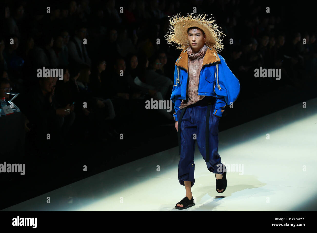 A model displays a creation by a graduate at a fashion show for ...