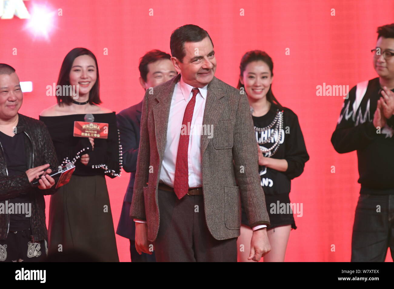 English actor Rowan Atkinson plays Mr. Bean during a premiere for his ...