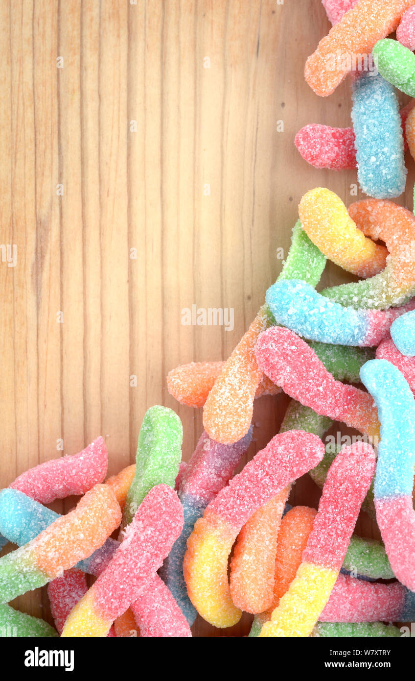 colorful neon gummy candies for background use Stock Photo - Alamy