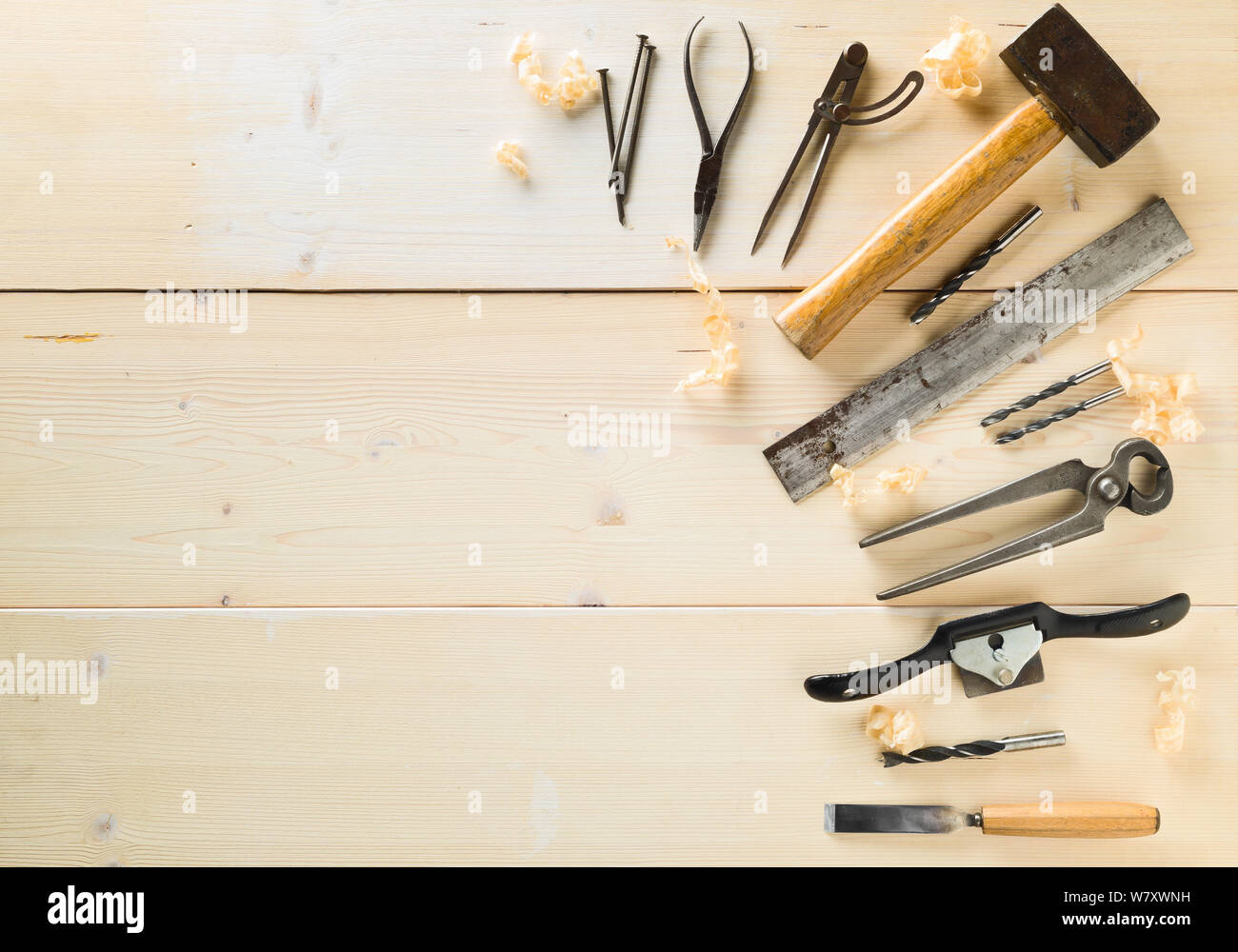 Collection of old, used wood working tools flat lay from above on light ...