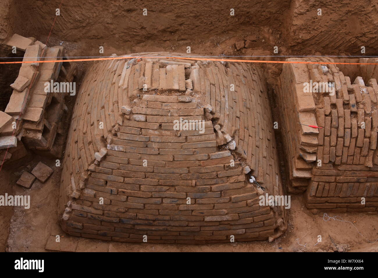 View of a tomb in the shape of a pyramid at the evacuation site of a ...