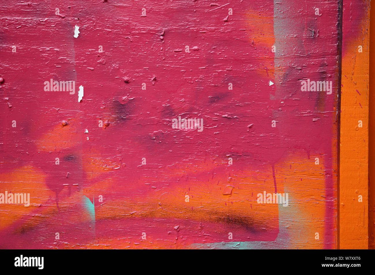 Wooden painted panel with yellow and reddish pink colours Stock Photo ...