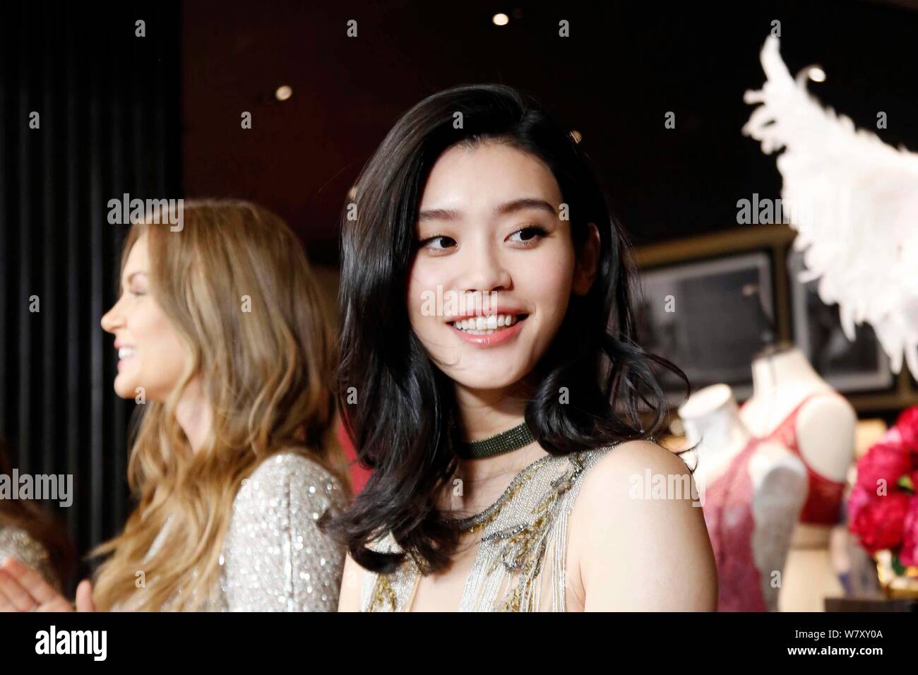 Chinese model Xi Mengyao, better known as Ming Xi, poses at the opening ...
