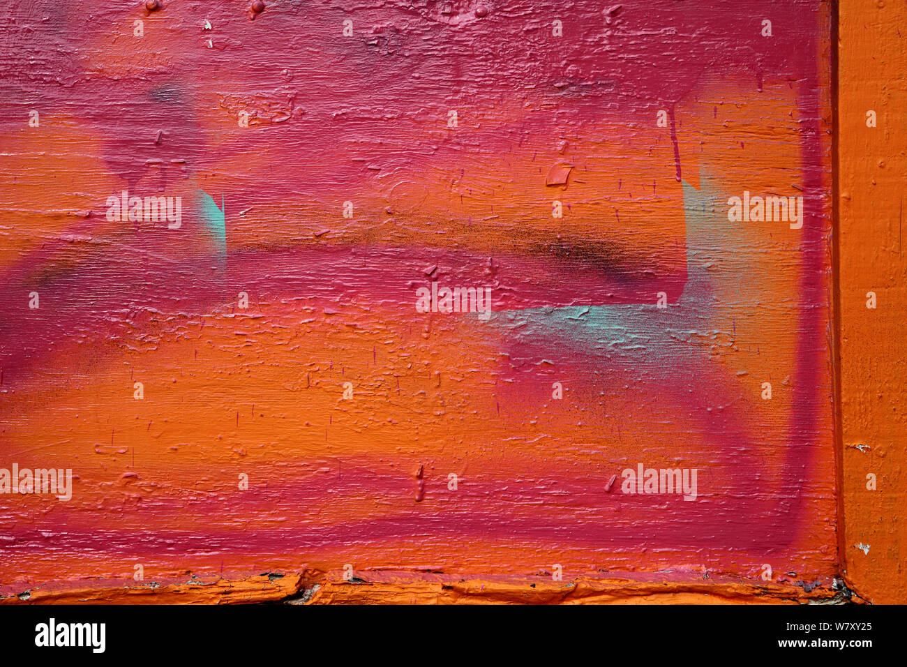 Wooden painted panel with yellow and reddish pink colours Stock Photo ...