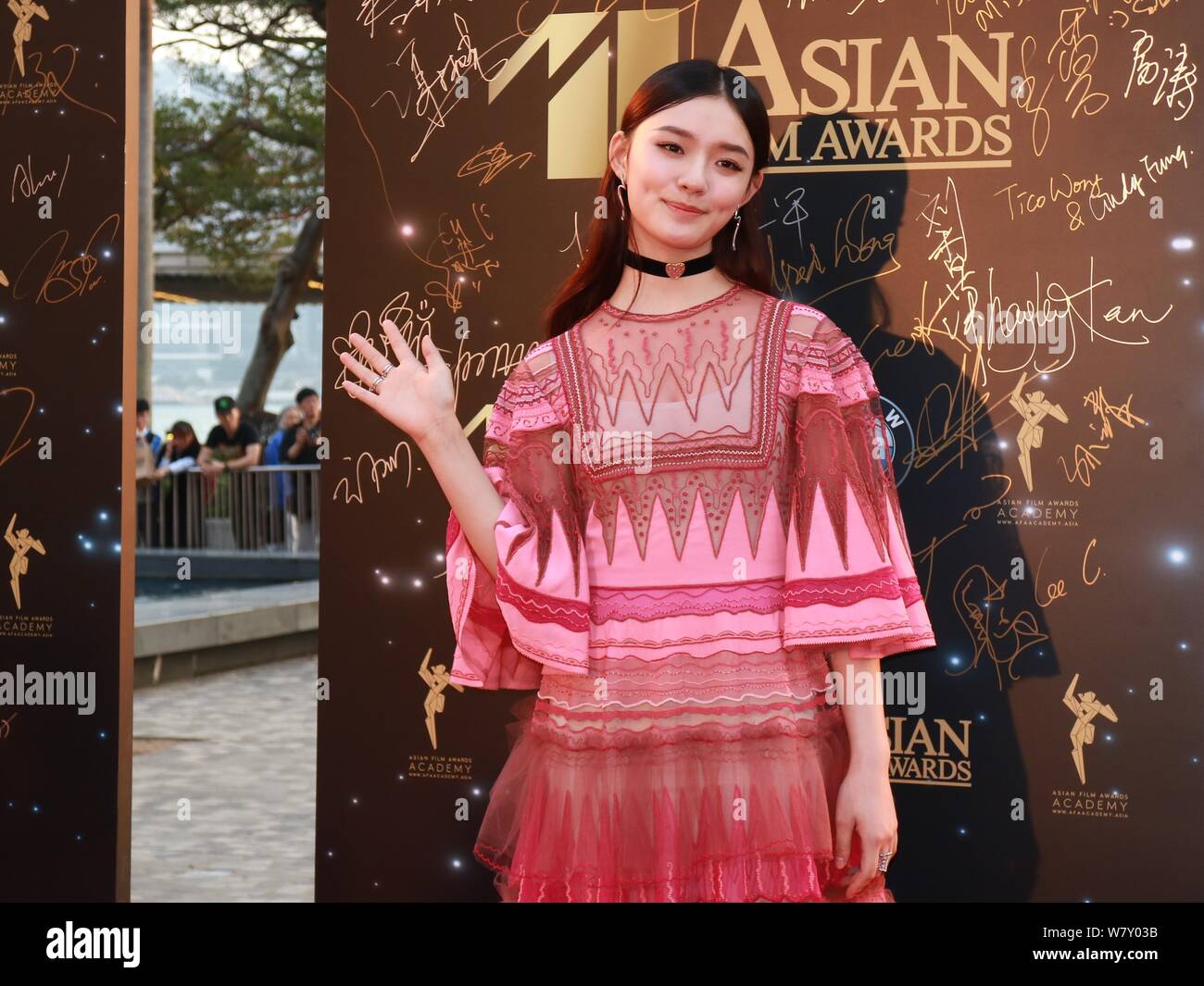 Chinese actress Lin Yun poses on the red carpet as she arrives during ...