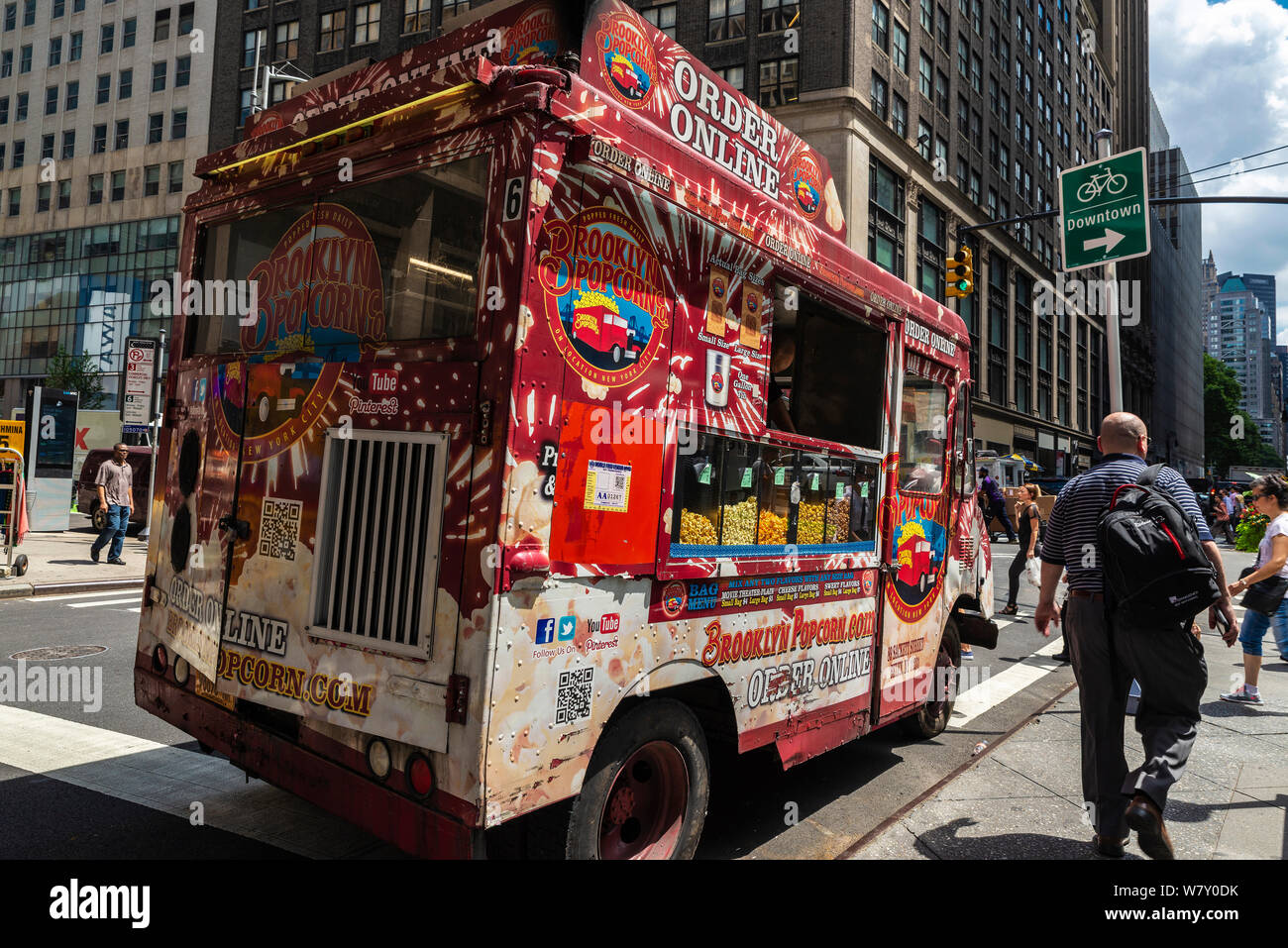 New York City, USA - August 2, 2018: Food truck of popcorn with people ...