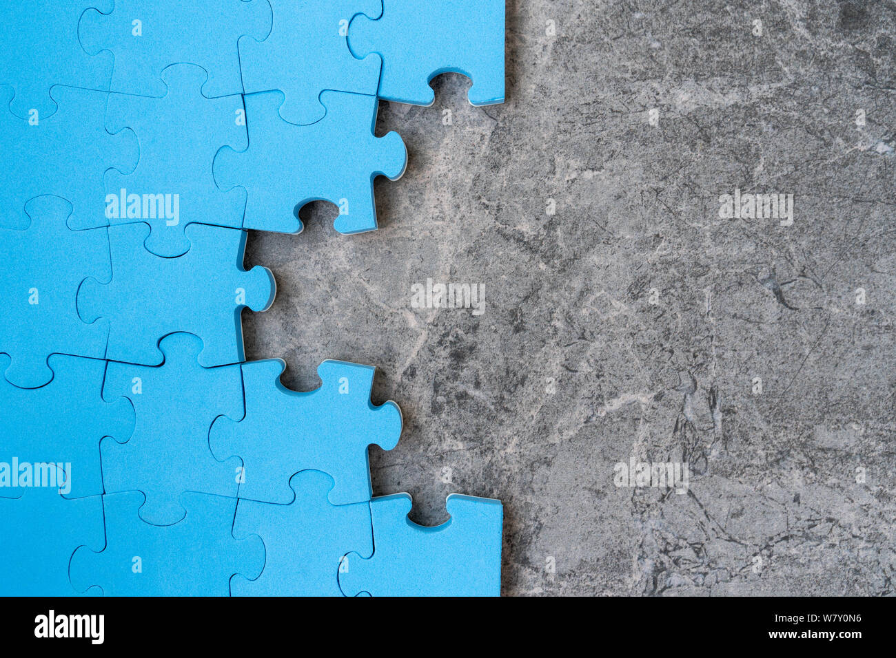 Blue jigsaw puzzle pieces hi-res stock photography and images - Alamy