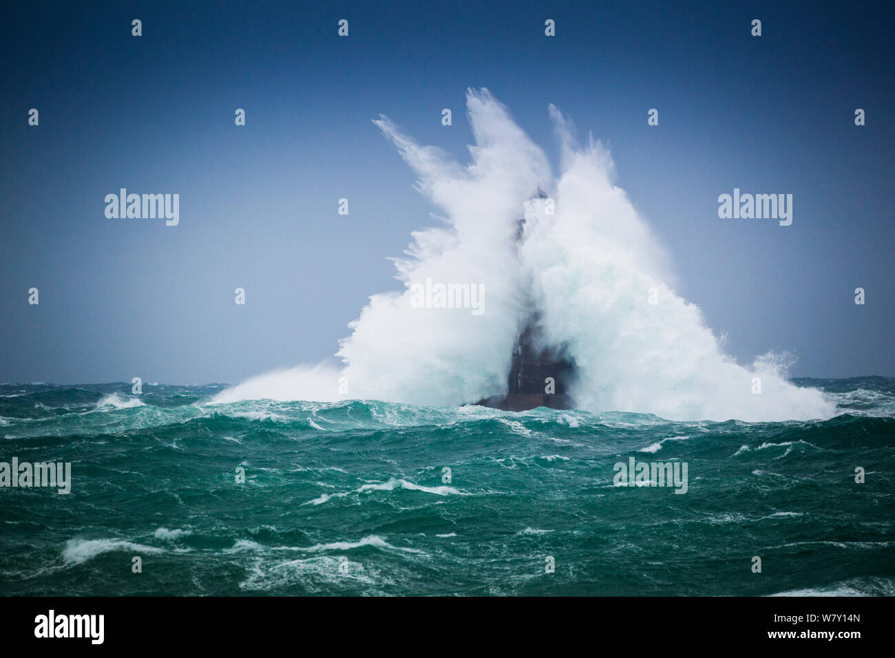 Waves lashing the Four Lighthouse during winter storm, Northern ...