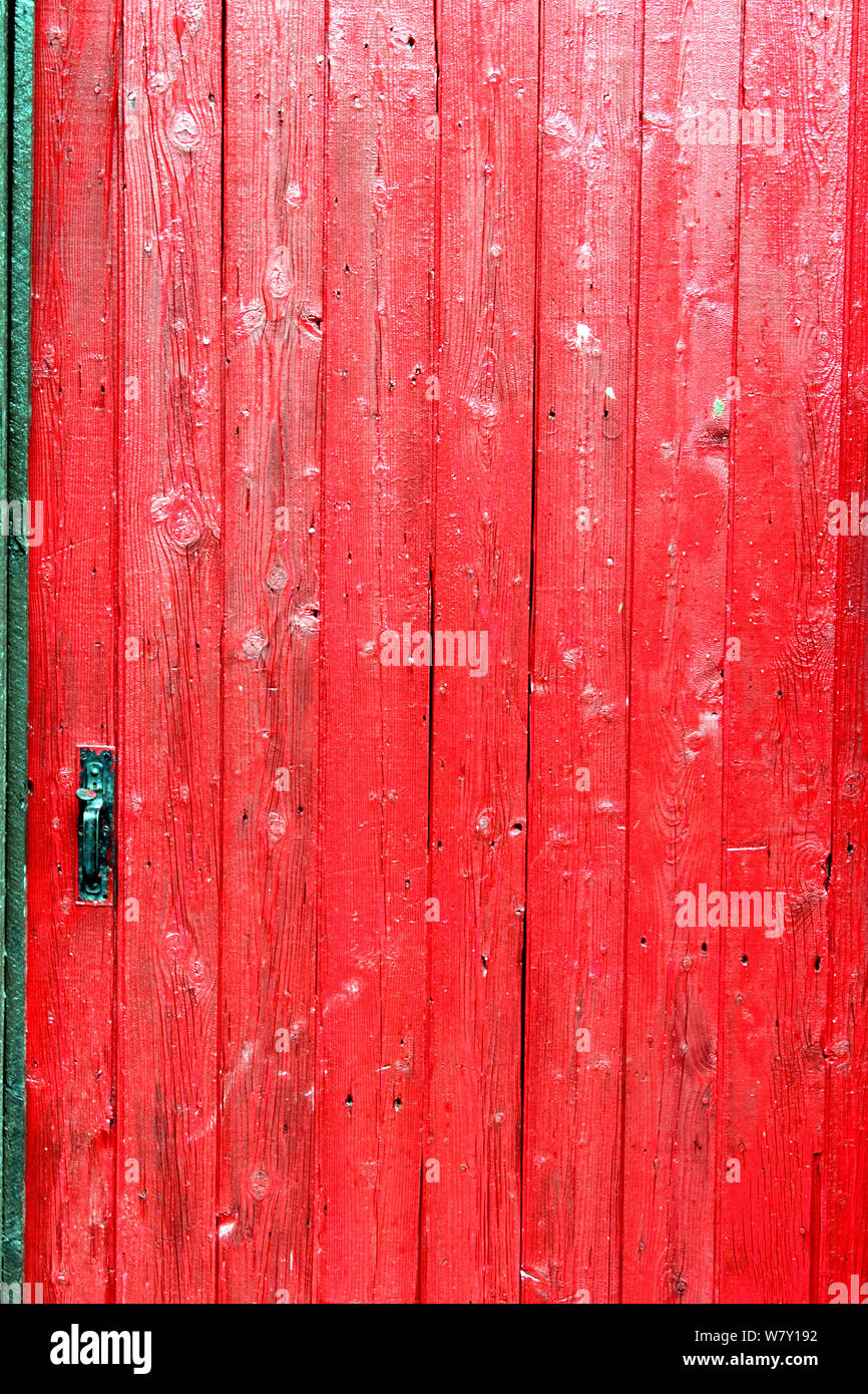 Old red painted wooden door Stock Photo - Alamy