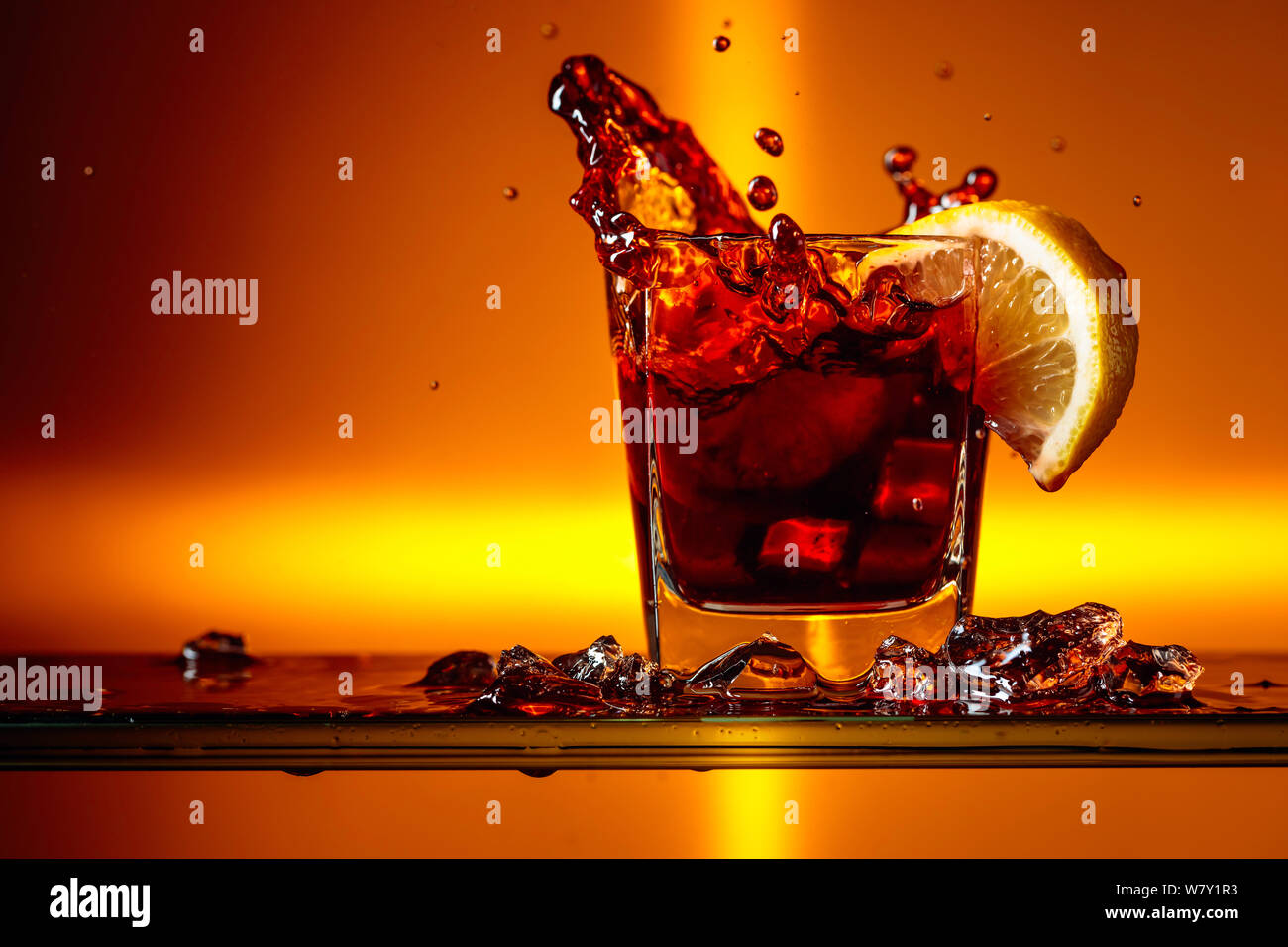 Cola glass lemon falling hi-res stock photography and images - Alamy
