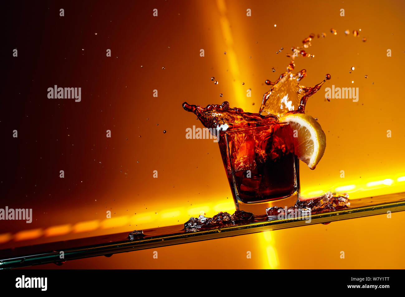 Cola glass lemon falling hi-res stock photography and images - Alamy