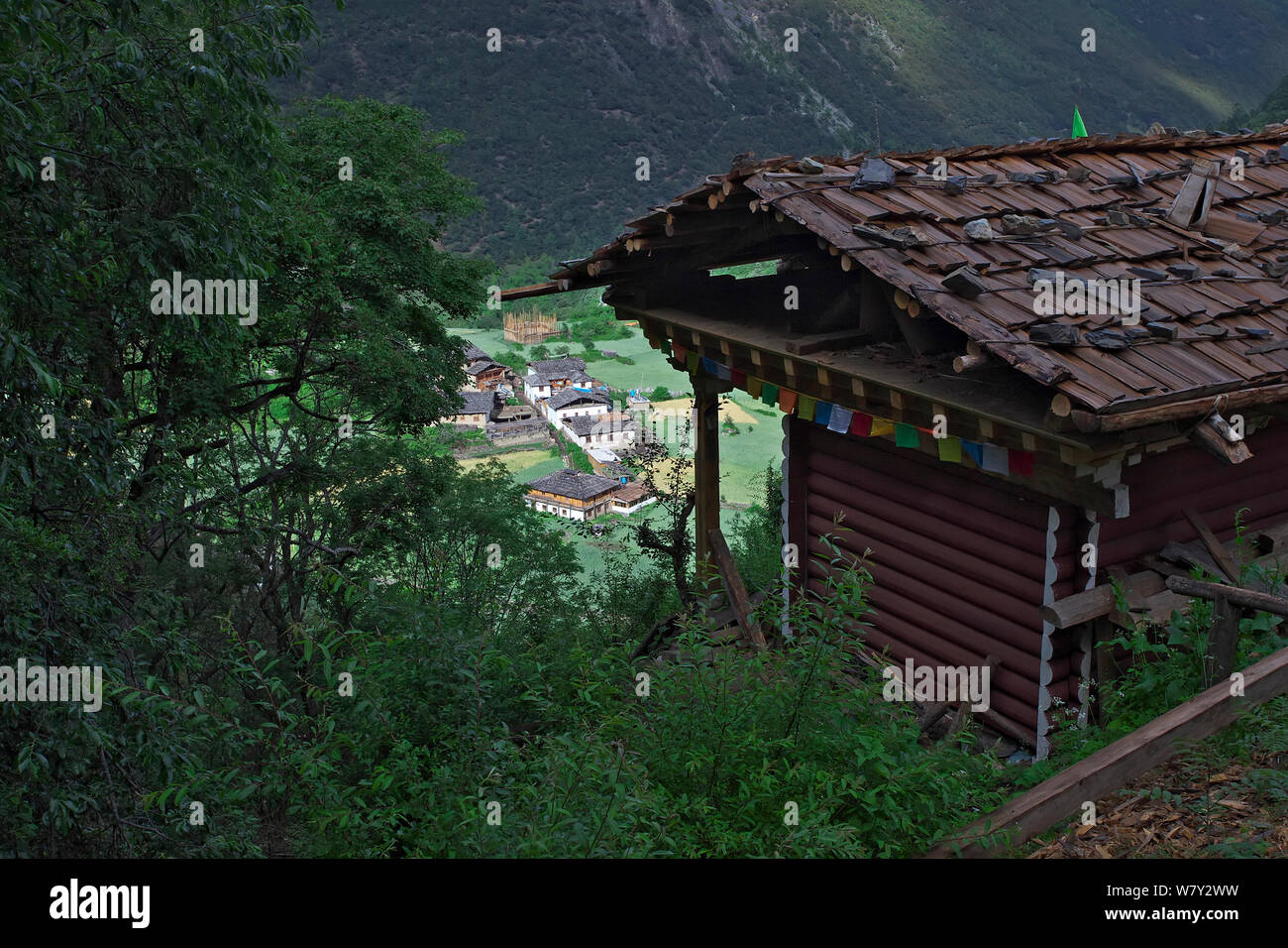 Building with traditional architecture and prayer flags Kawakarpo ...