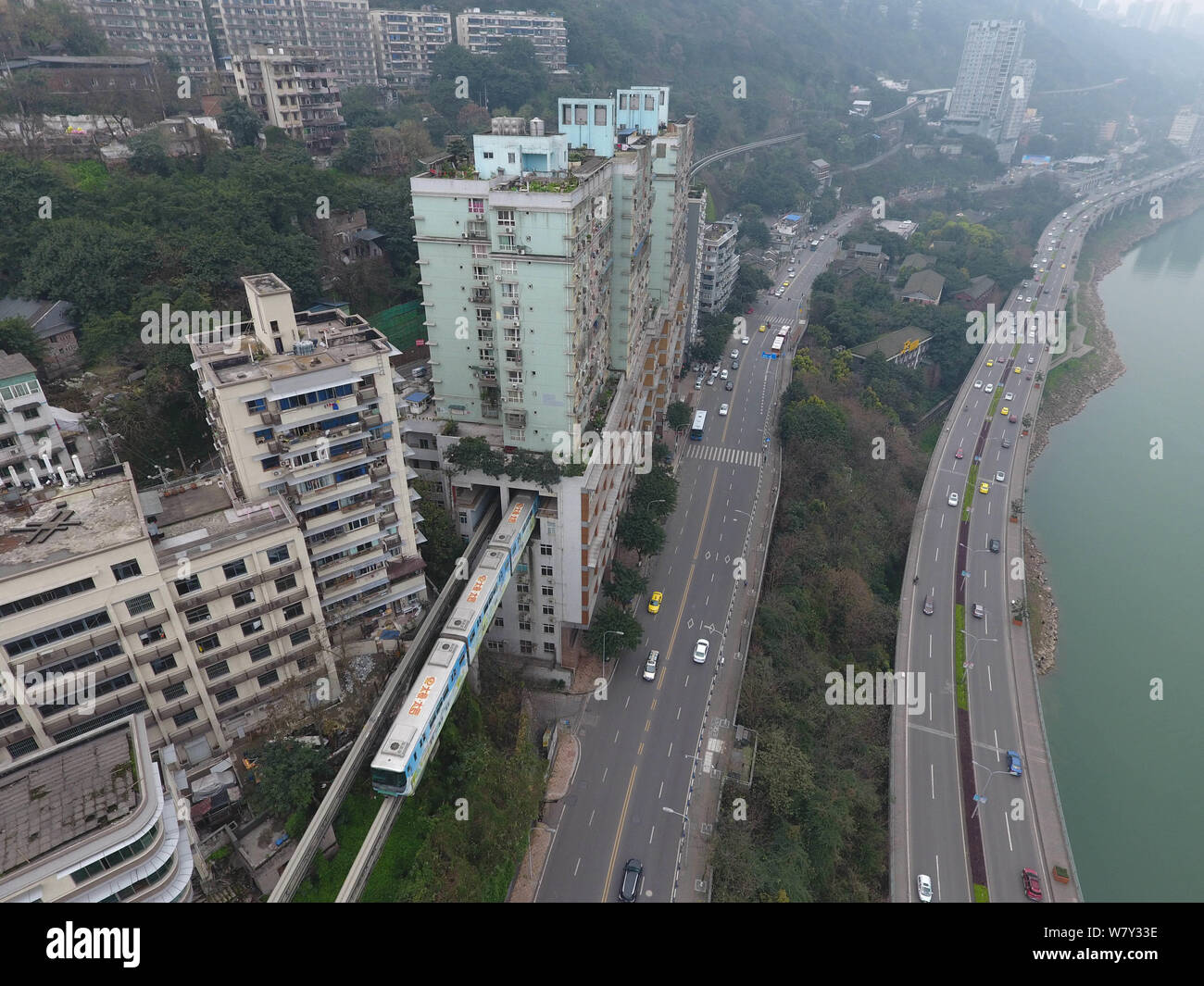 A subway train of Chongqing Light rail Line 2 arrives at the Liziba ...