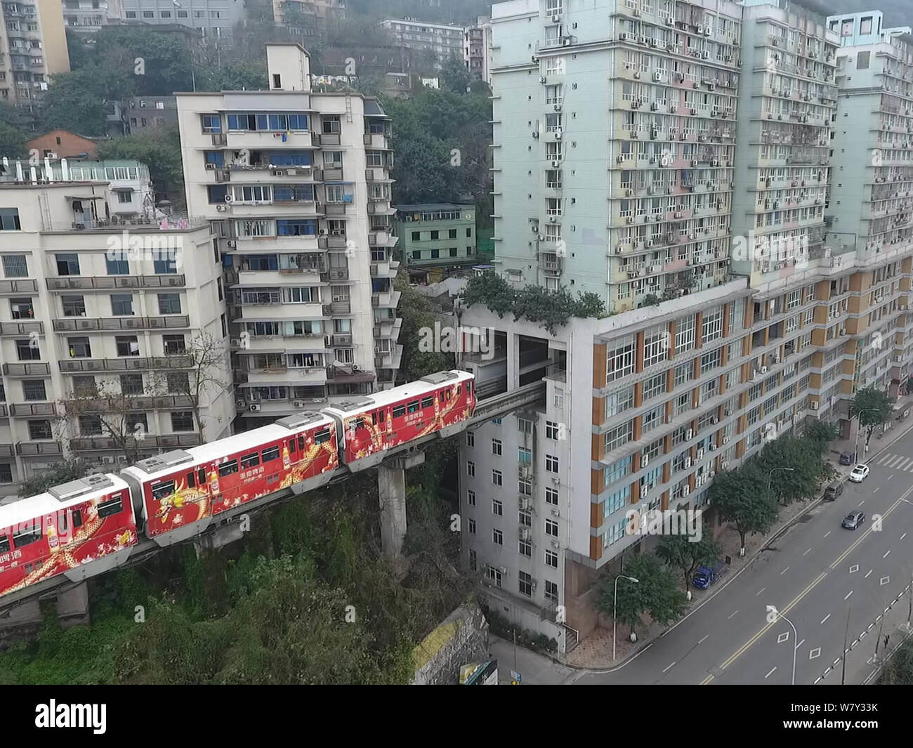 A subway train of Chongqing Light rail Line 2 arrives at the Liziba ...