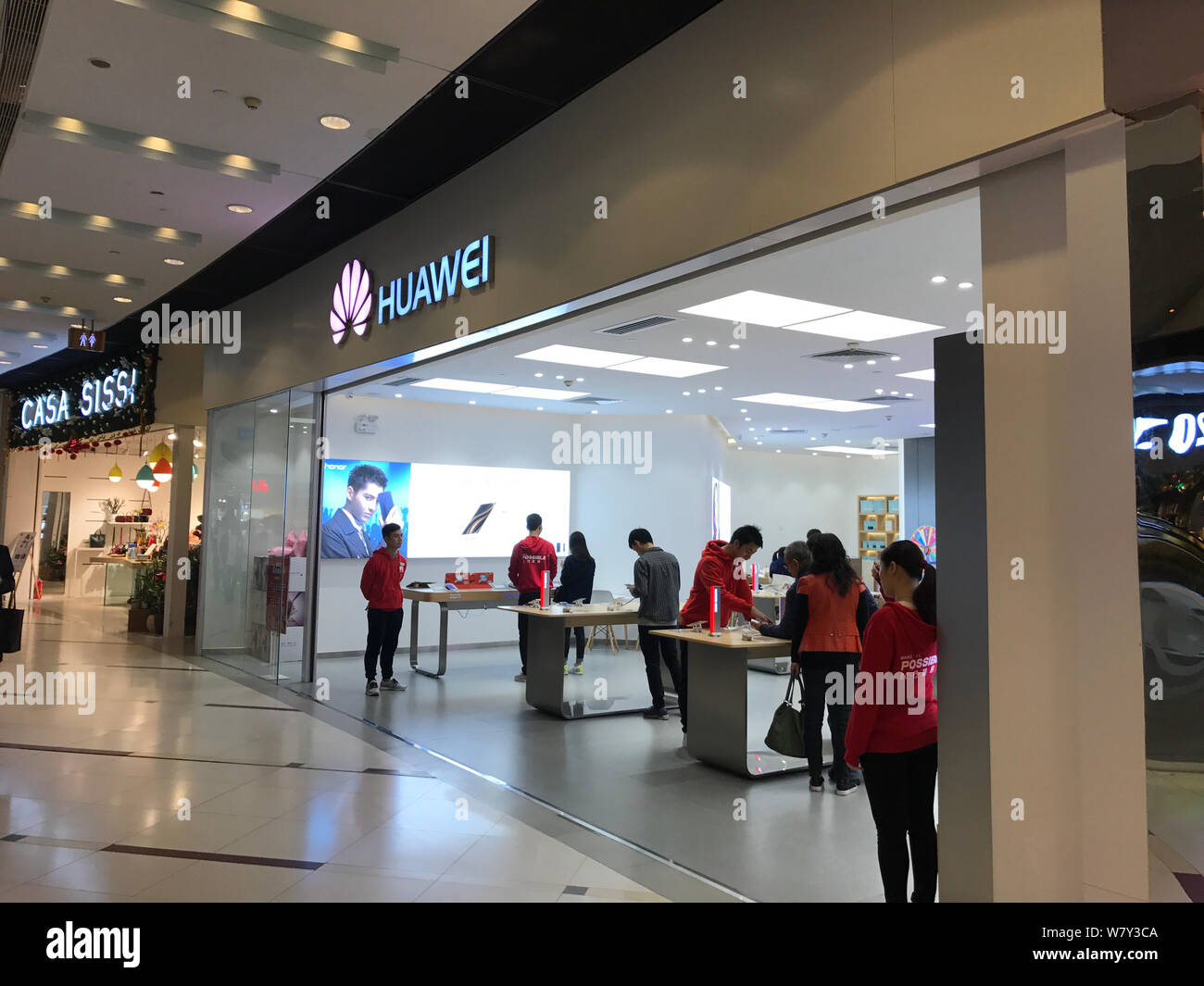 --FILE--Chinese employees are seen at a branch of Huawei in Guangzhou ...
