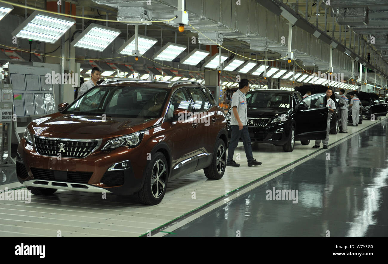 Peugeot factory workers hi-res stock photography and images - Alamy