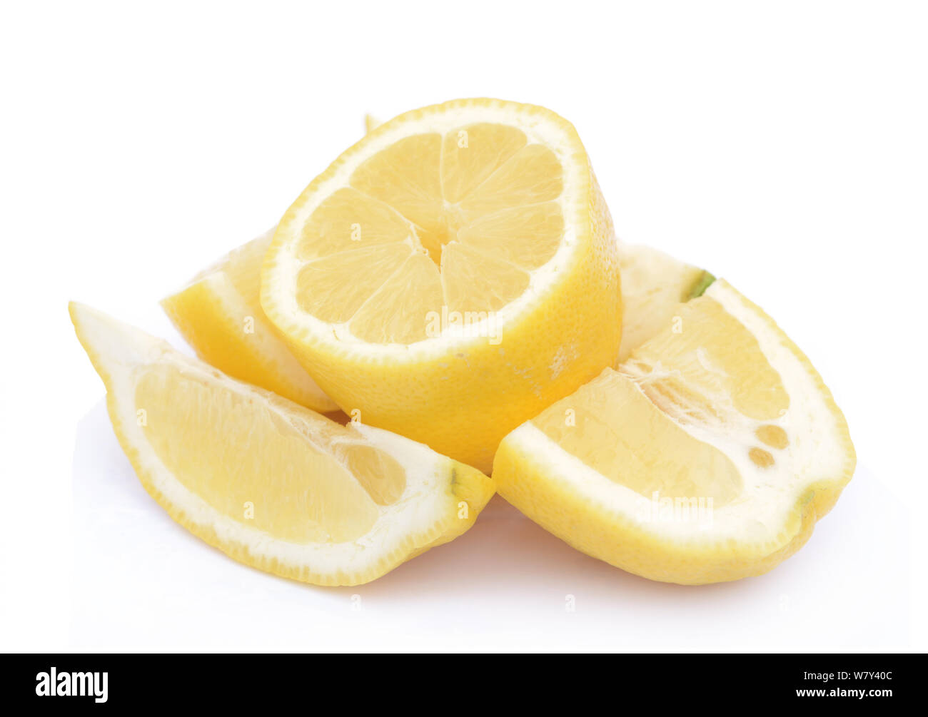 chopped and whole fresh yellow lemons on white background Stock Photo ...