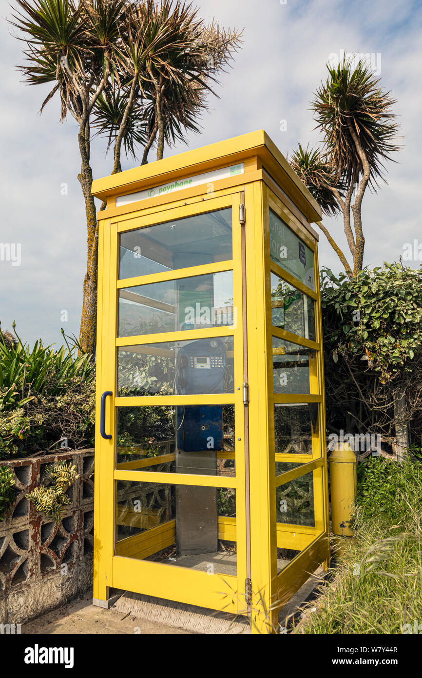 Yellow telephone box hi-res stock photography and images - Alamy