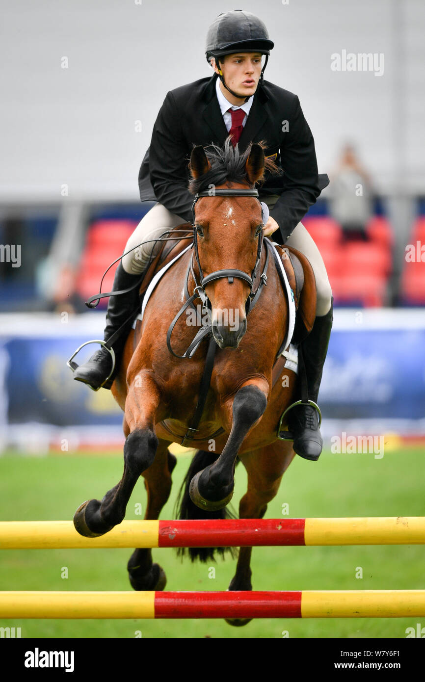 Great britains oliver murray jumps second fence hi-res stock ...