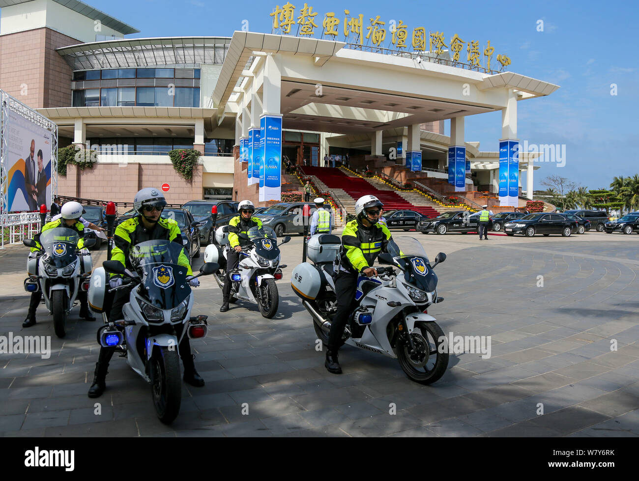 Chinese police officers riding motorcycles prepare to patrol the BFA ...