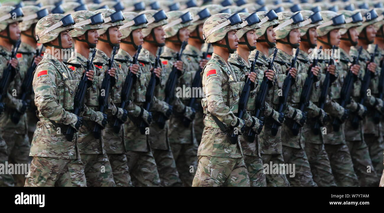 --FILE--Chinese PLA (People's Liberation Army) soldiers march past the ...