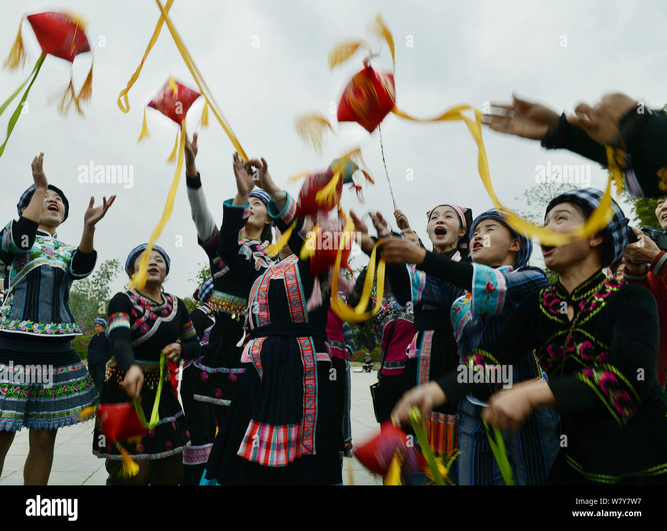 --FILE--Chinese people of Bouyei ethnic group wearing traditional ...