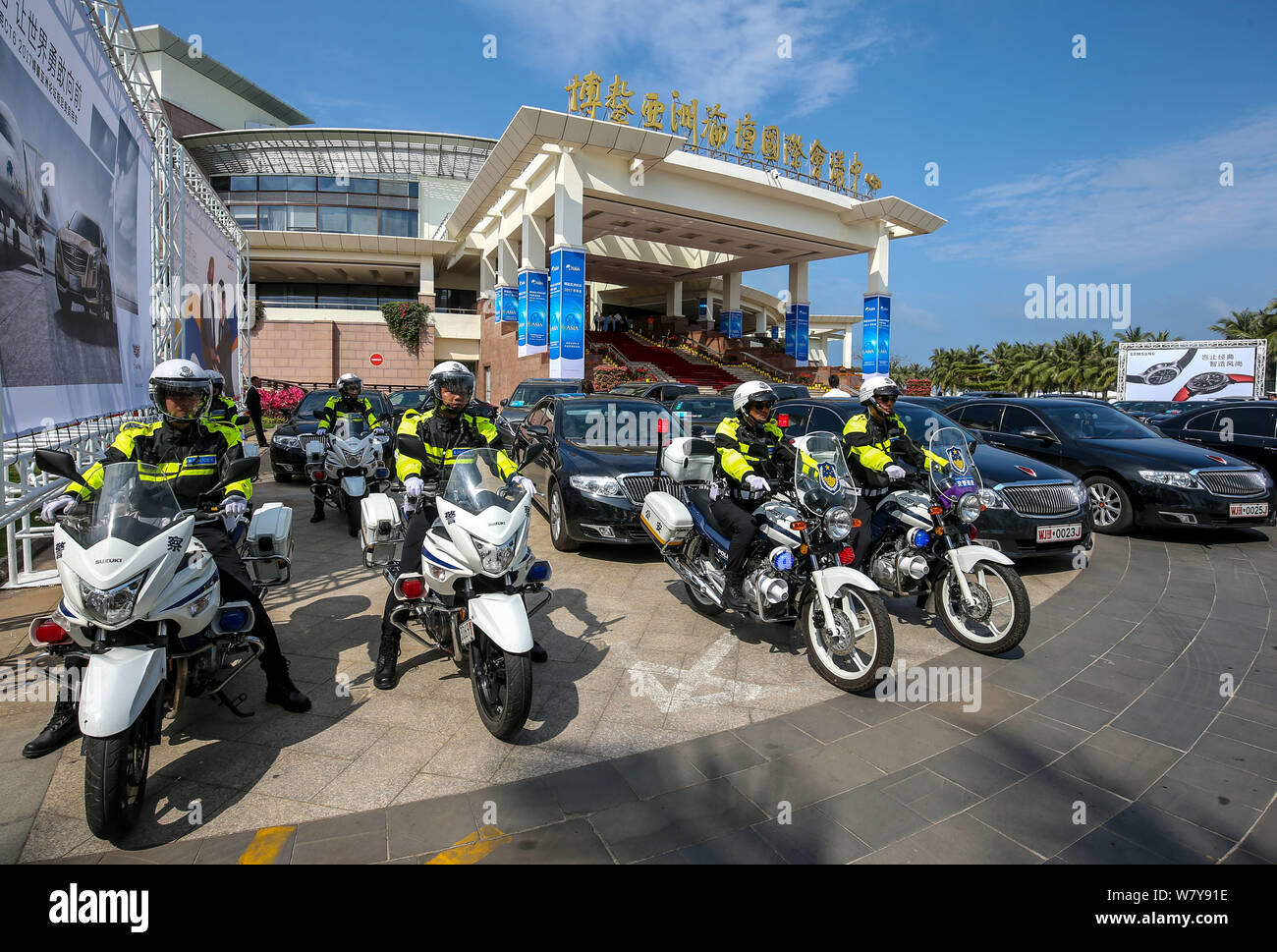 Chinese police officers riding motorcycles prepare to patrol the BFA ...