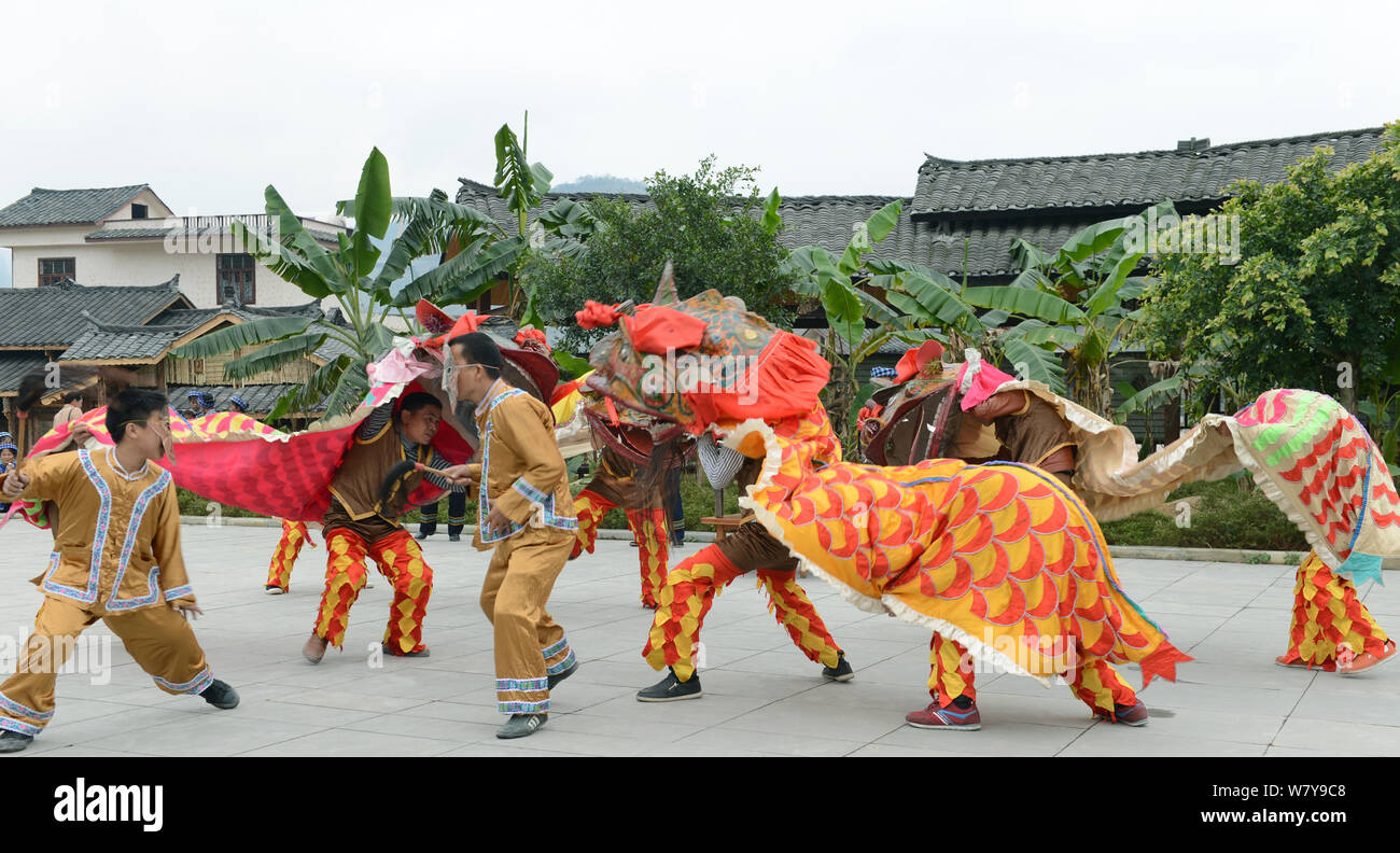 --FILE--Chinese people of Bouyei ethnic group wearing traditional ...