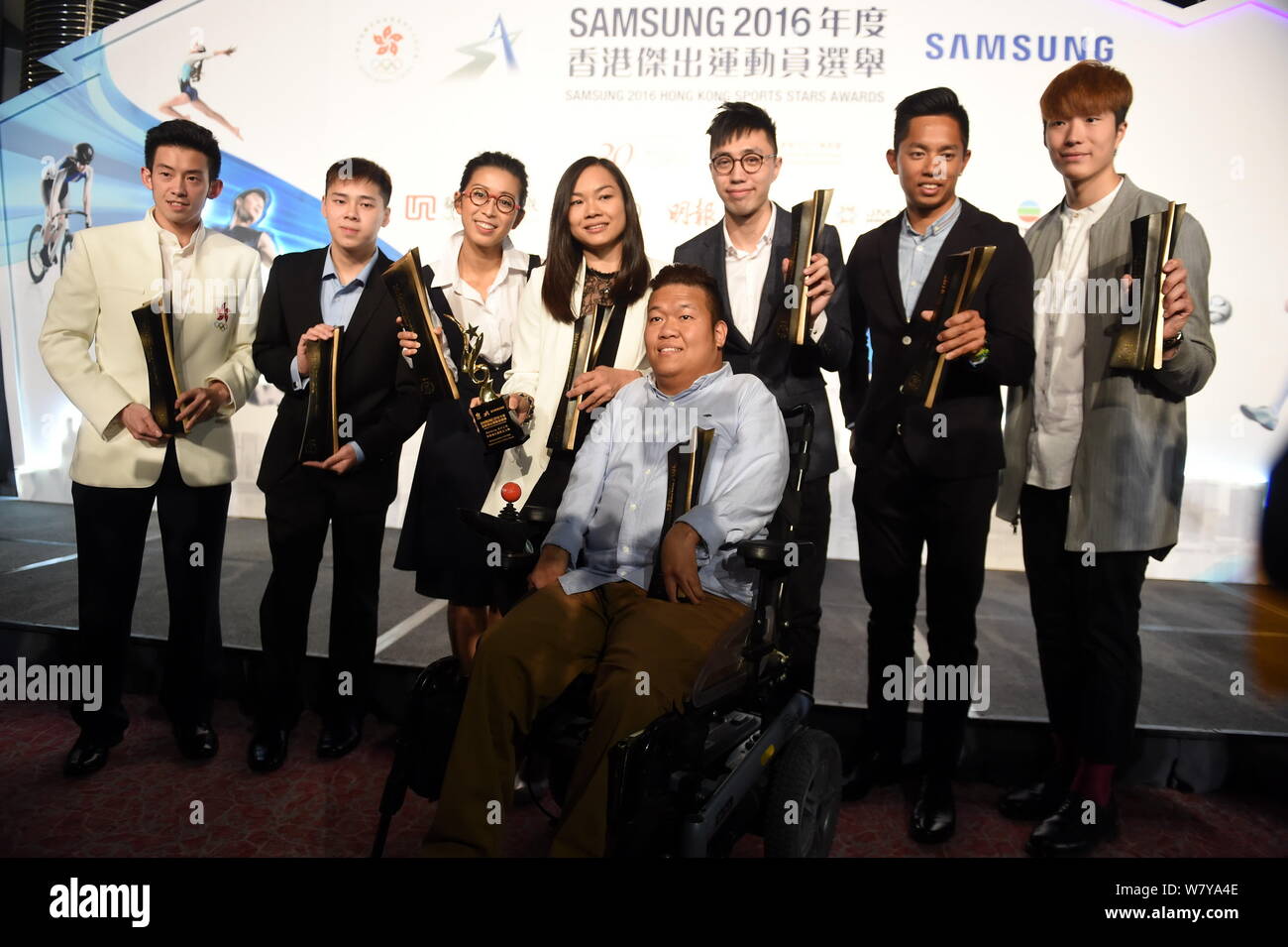 Winners pose hi-res stock photography and images - Alamy