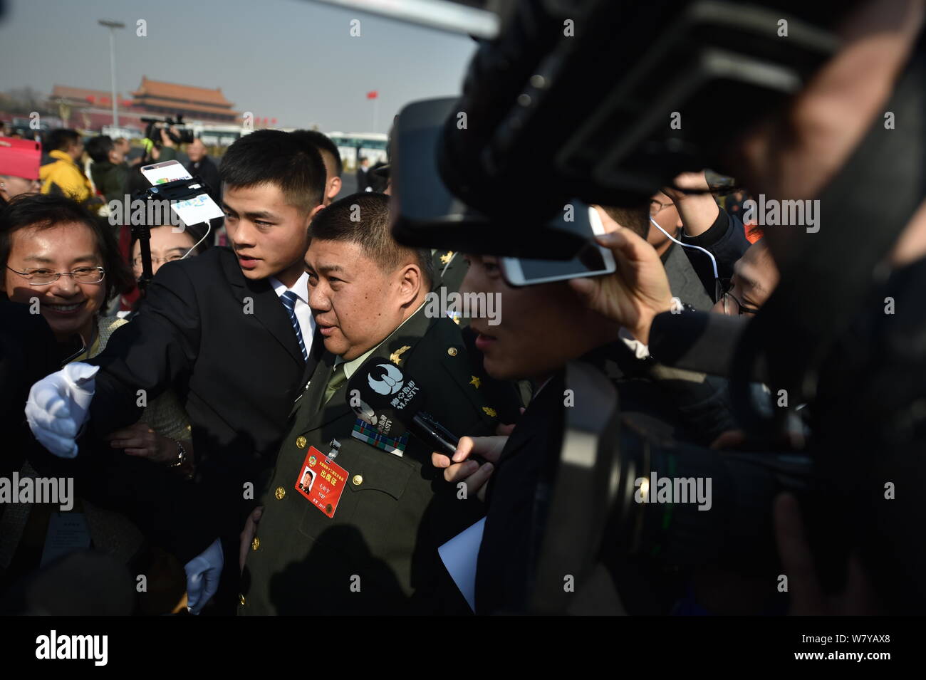 Chinese general Mao Xinyu, center, the grandson of Mao Zedong, arrives ...