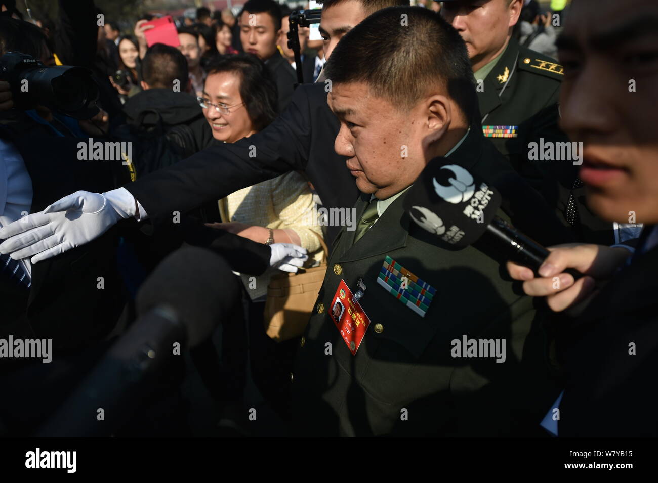 Chinese general Mao Xinyu, center, the grandson of Mao Zedong, arrives ...