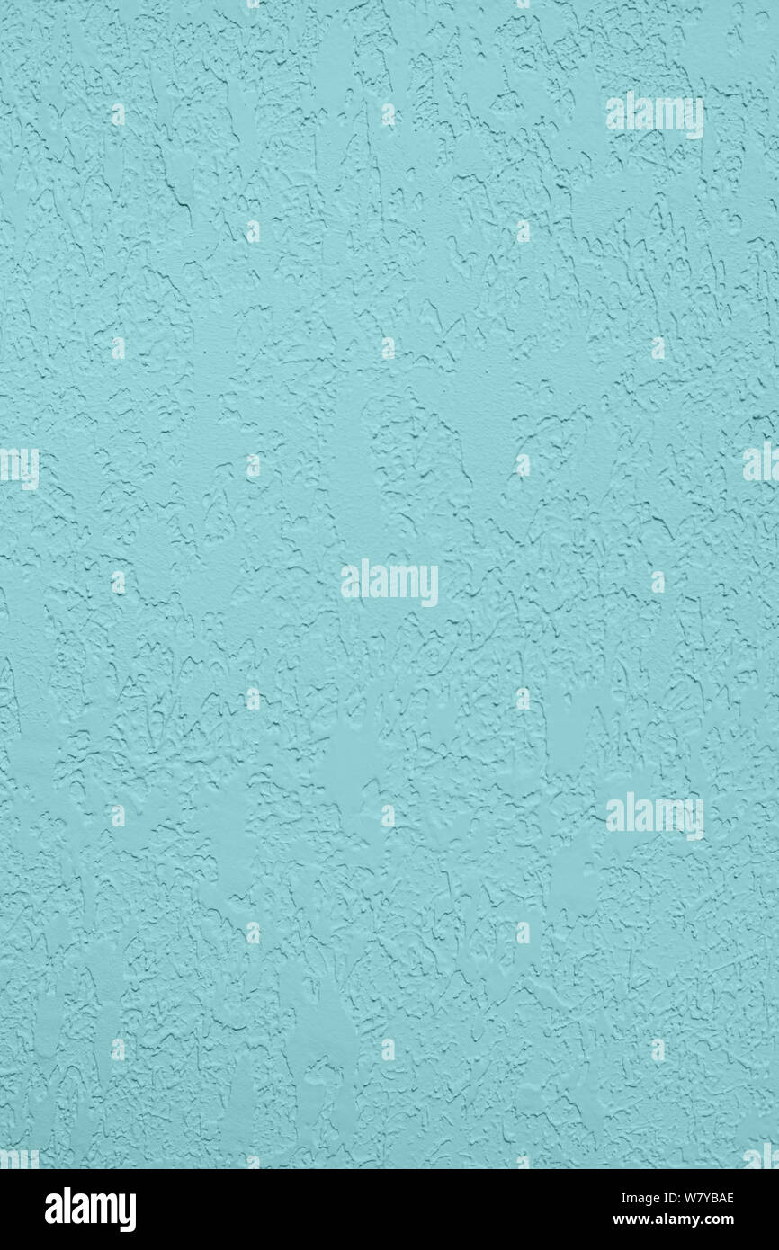 Pale blue colored low contrast Concrete textured background with ...