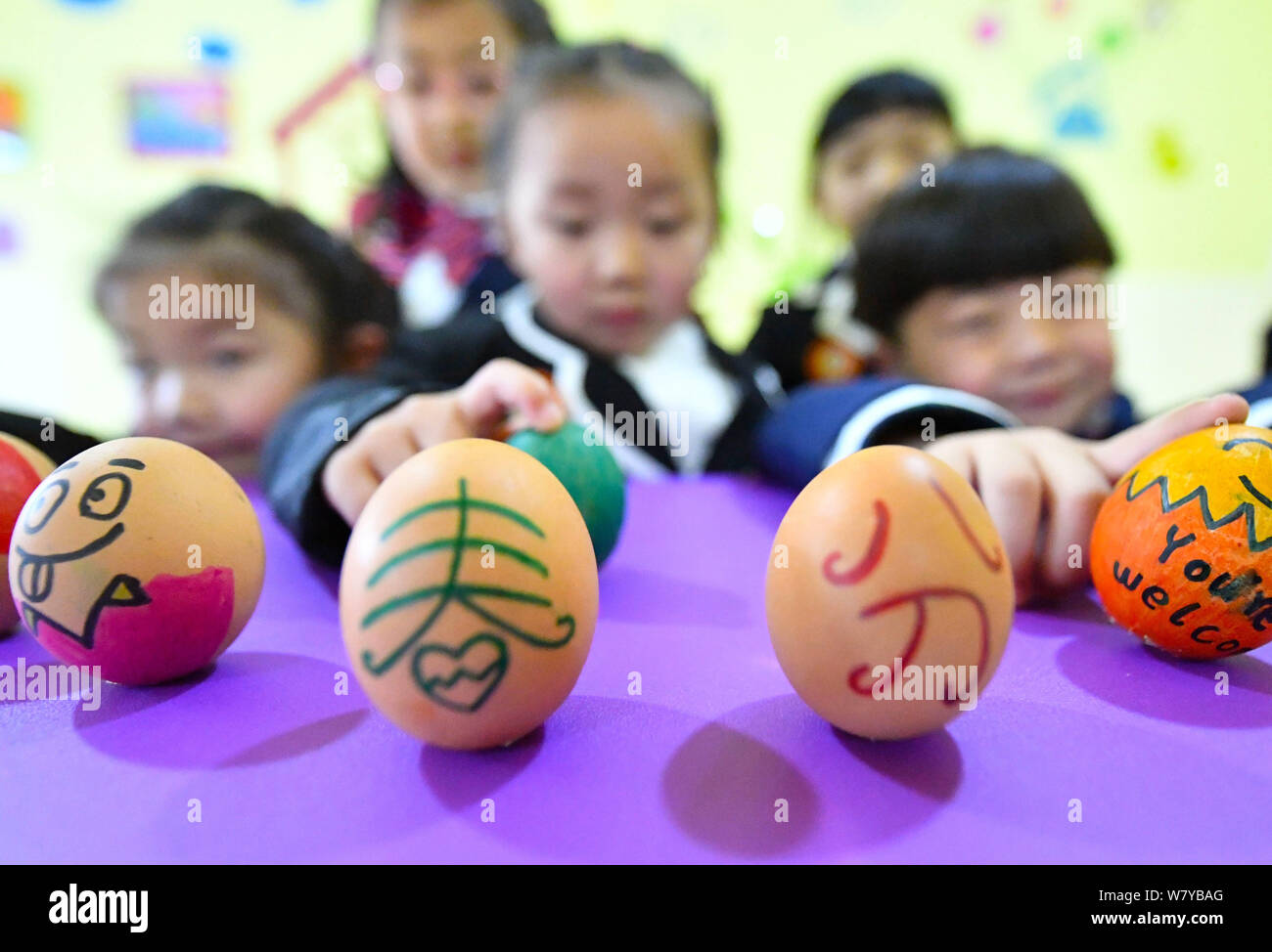 Chinese kids play eggs hi-res stock photography and images - Alamy
