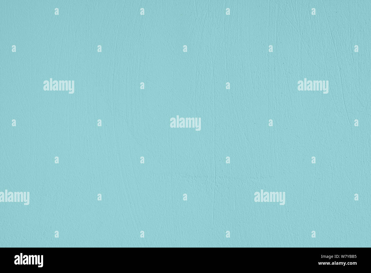 Pale blue colored low contrast Concrete textured background with ...