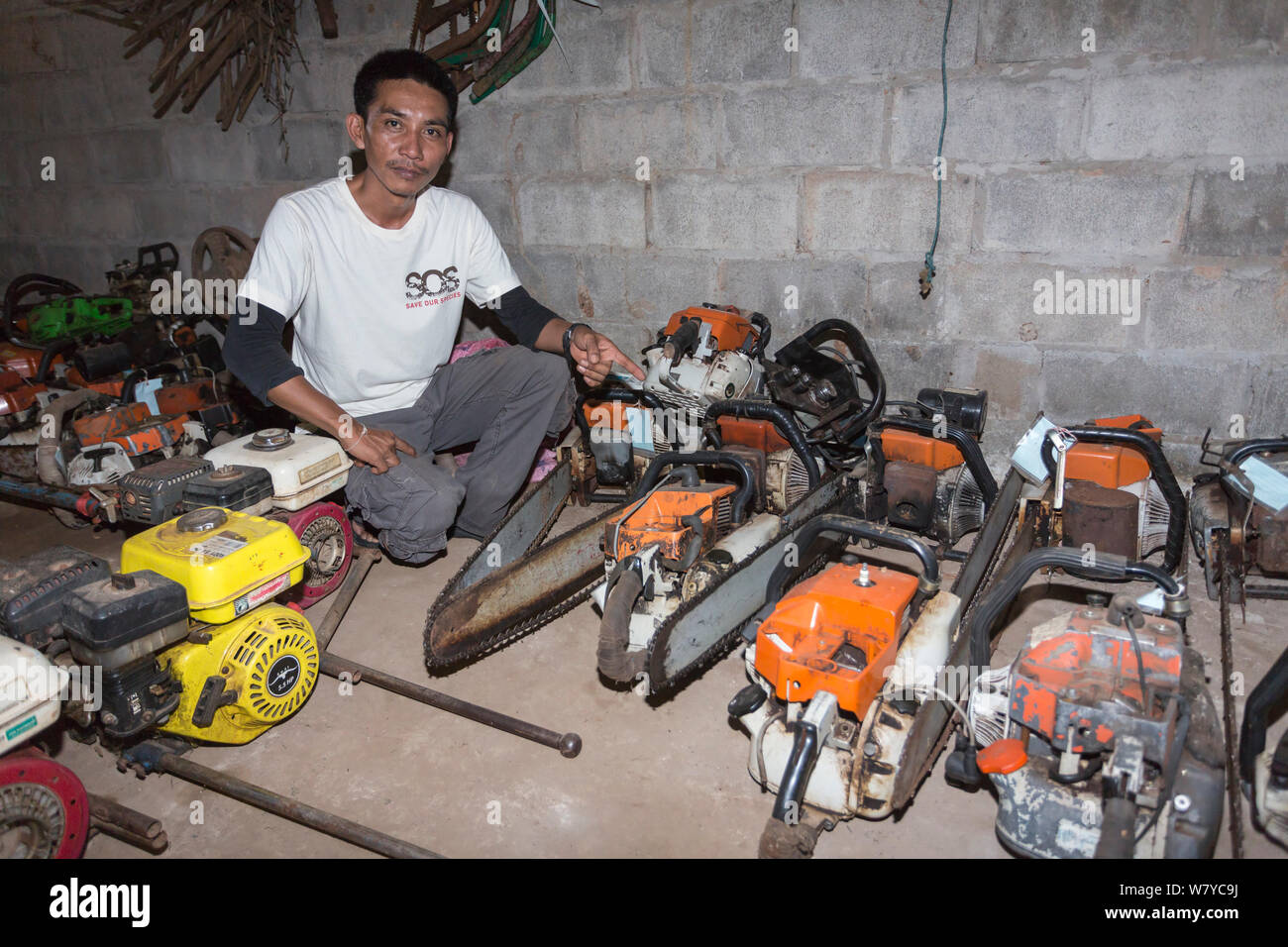 Sayan Raksachart of Freeland Foundation, with confiscated outboard ...