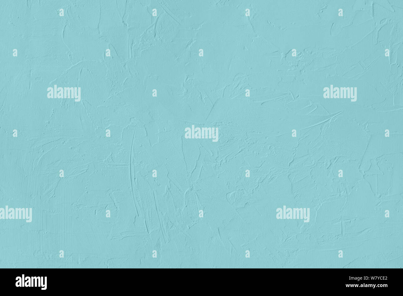 Pale blue colored low contrast Concrete textured background with ...