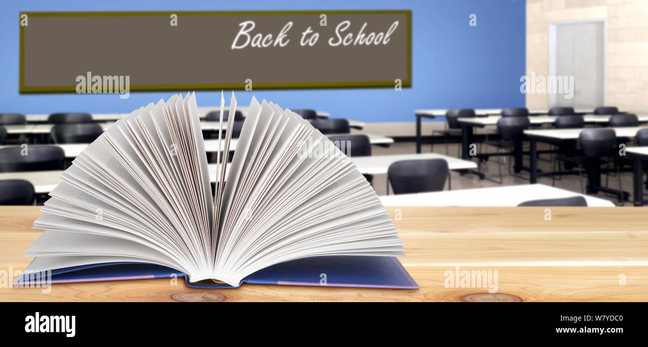 Back To School concept with stack of books in the classroom Stock Photo ...