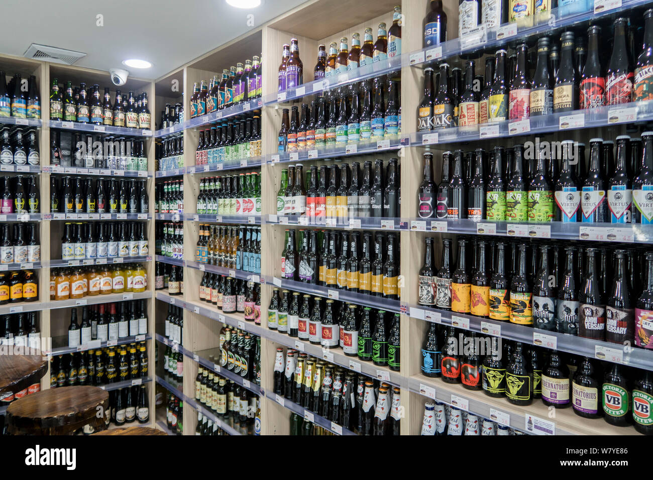 Bottles of imported beer are for sale in the Haifu Convenience Store ...