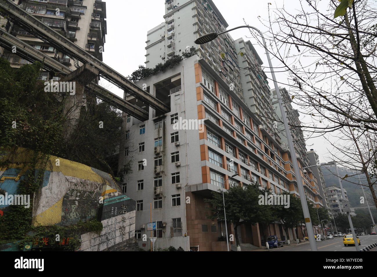 View of tracks of Chongqing Light rail Line 2 through a residential ...