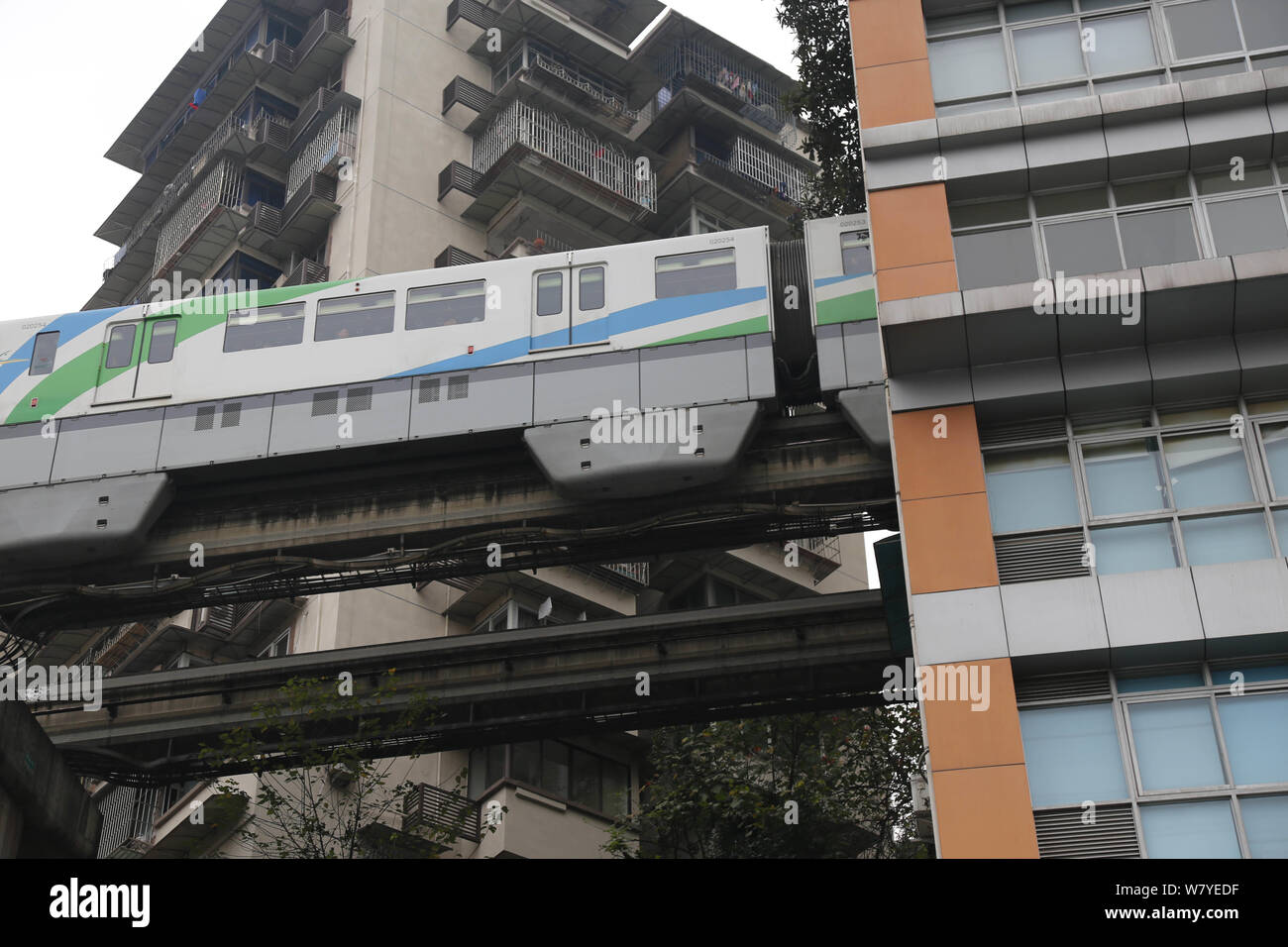 A subway train of Chongqing Light rail Line 2 arrives at the Liziba ...