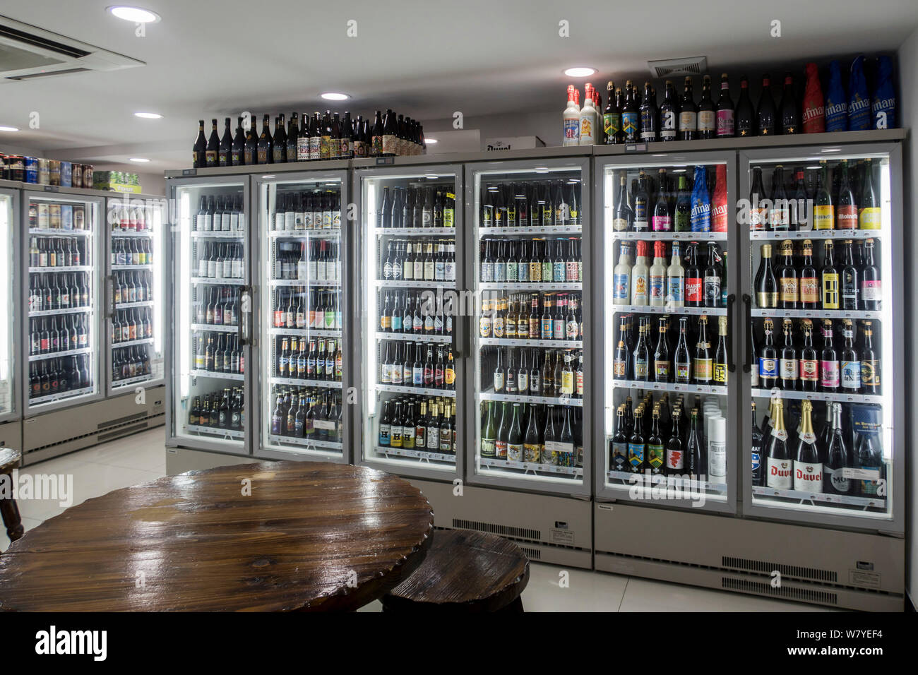 Bottles of imported beer are for sale in the Haifu Convenience Store ...