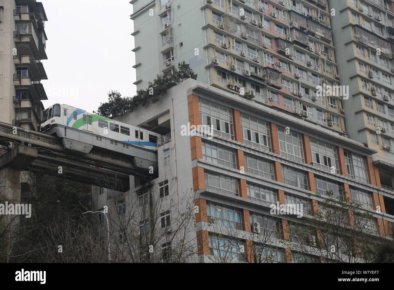A subway train of Chongqing Light rail Line 2 arrives at the Liziba ...