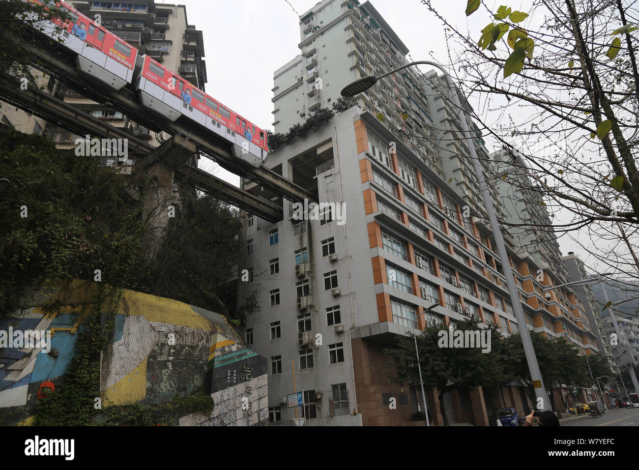 A subway train of Chongqing Light rail Line 2 arrives at the Liziba ...