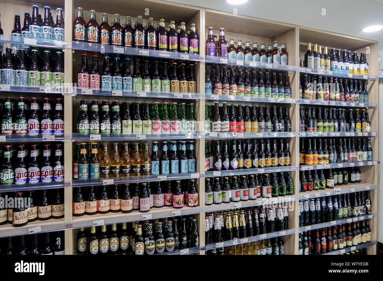 Bottles of imported beer are for sale in the Haifu Convenience Store ...