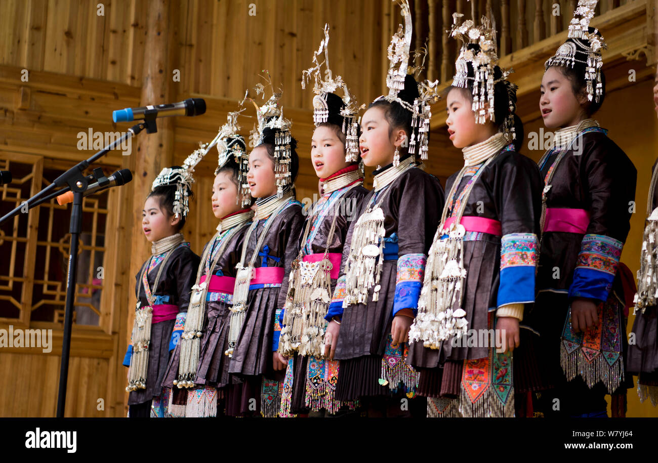 Chinese women of Dong ethnic group wearing traditional costumes perform ...